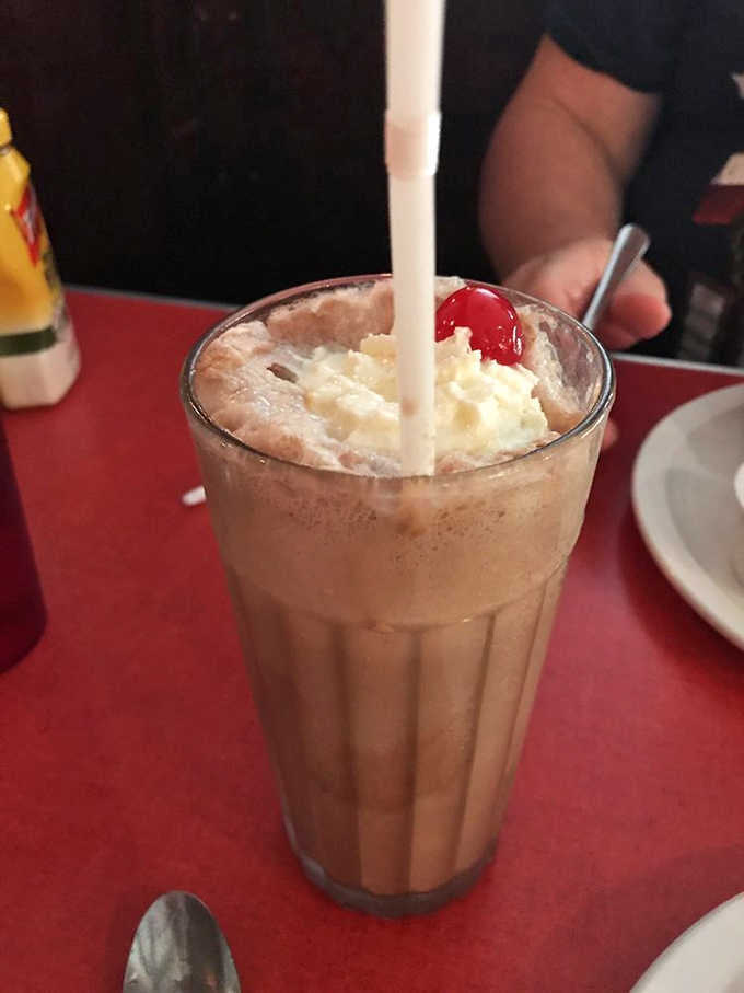 That cherry on top isn't just decoration, it's the exclamation point on a chocolate masterpiece worth every calorie.