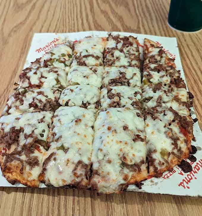 When cheese and sausage meet that signature thin crust, you get a pizza that's been making Daytonians happy for generations.