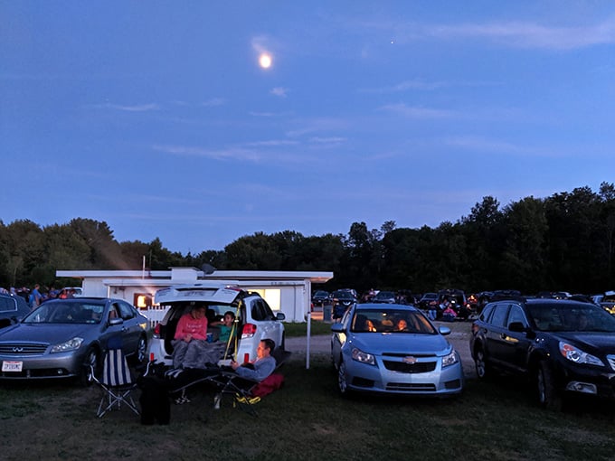 The moon rising over a packed lot of movie lovers&mdash;nature's own opening credits playing overhead.