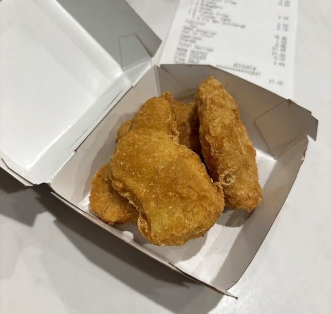 Golden, crispy, and completely oblivious to their elegant surroundings, these nuggets are living their best colonial life.