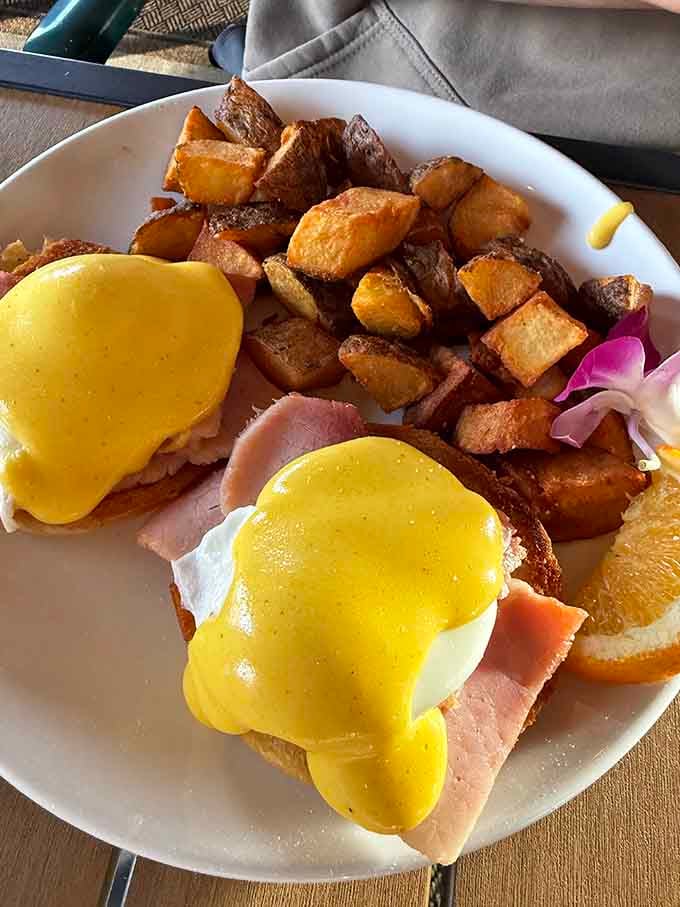 When your Benedict comes with a side of crispy potatoes this good, you understand why people wait.