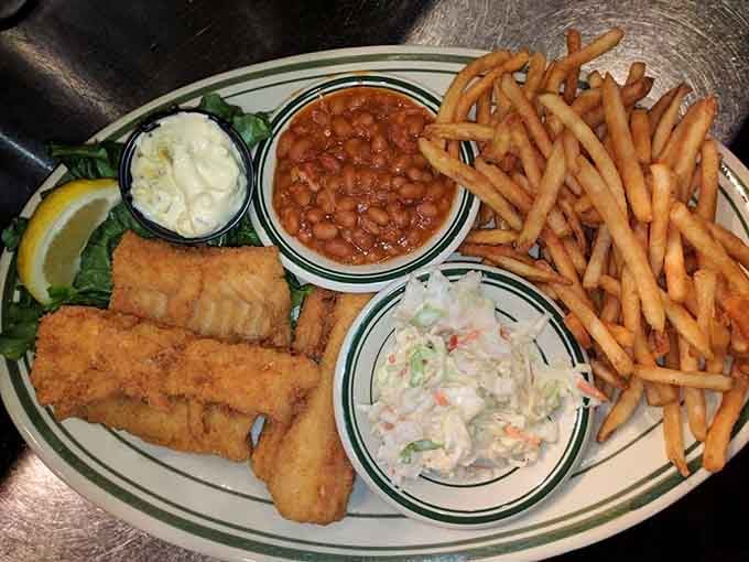 Golden-battered cod with crispy fries and beans proves Friday traditions know no borders or boundaries here.
