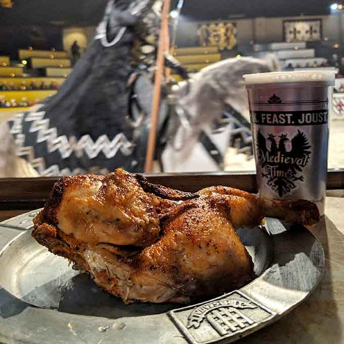 That golden roasted chicken glistening in the arena lights makes eating with your hands feel downright sophisticated.