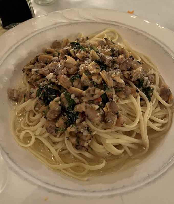 Linguine topped with treasures that make you understand why people write poetry about the sea.