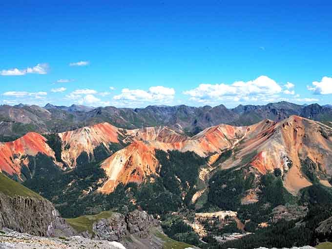 Red Mountain Pass painted these peaks like a sunset decided to retire here permanently and honestly, who could blame it?