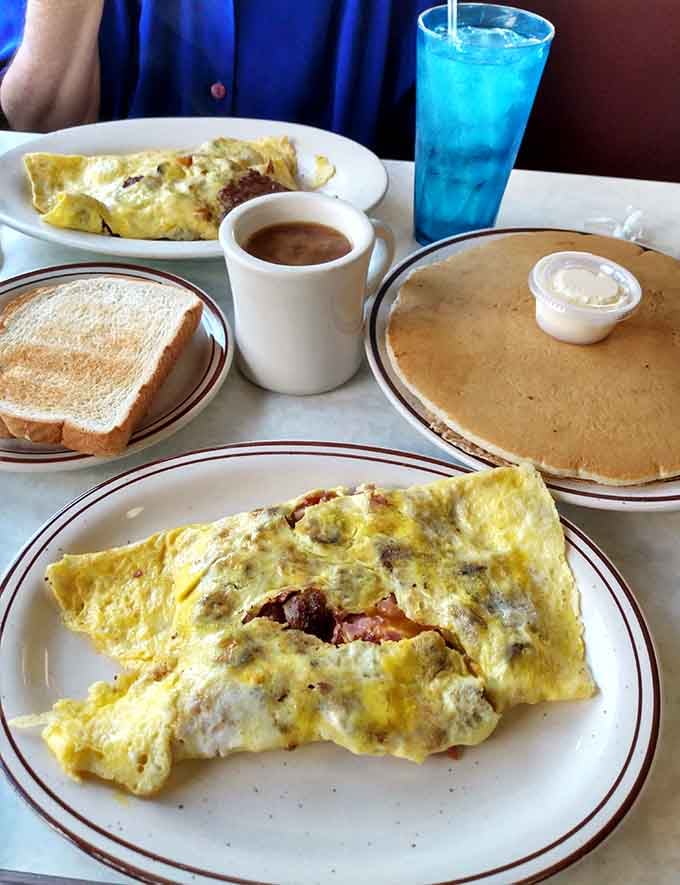 Fluffy omelets and pancakes the size of dinner plates prove breakfast here means serious business and serious satisfaction.