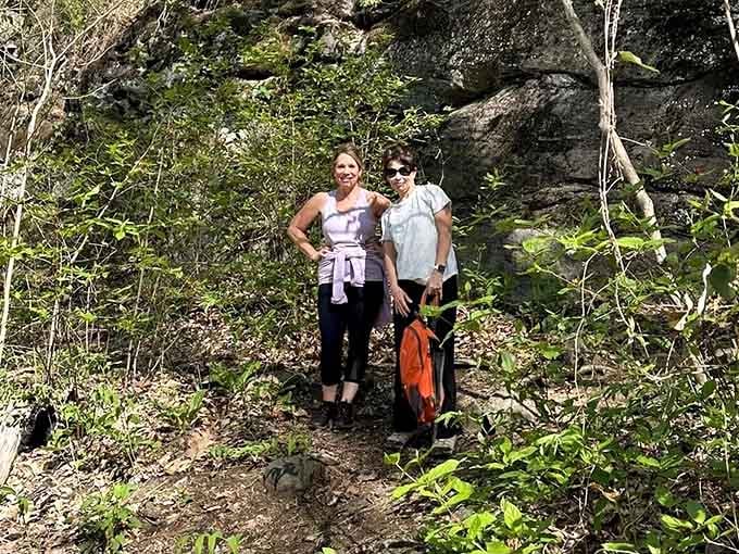 Two friends proving that the best adventures don't require matching outfits, just matching enthusiasm for impressive rock formations.