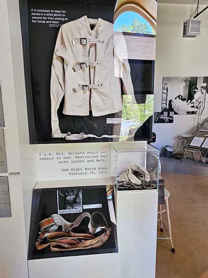 Vintage restraint jackets and leather straps remind us how far psychiatric treatment has evolved, thankfully.