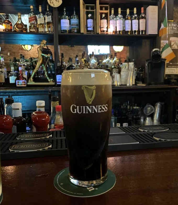A properly poured Guinness with that perfect creamy head is poetry in a glass, worth every second.