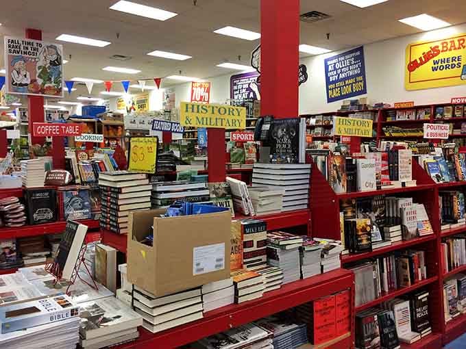 Books stacked this high at these prices mean your reading list finally becomes achievable instead of aspirational.
