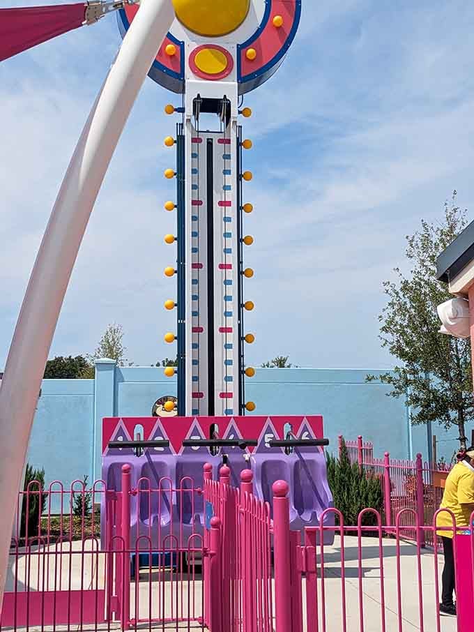 Nothing says "test your strength" quite like a carnival game themed after a construction worker pig.
