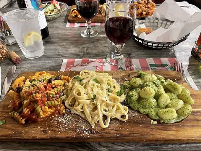 Three different pastas on one wooden board is the kind of brilliant problem-solving that should win awards.