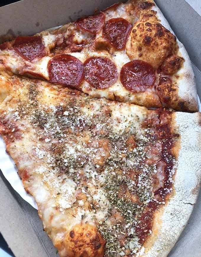 When pepperoni meets herbs and garlic on perfectly blistered crust, you're witnessing pizza artistry in its purest form.
