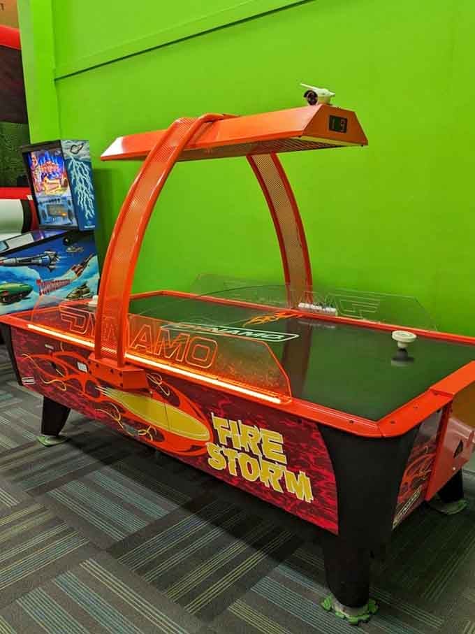Air hockey brings the heat with flames that match your competitive spirit perfectly.