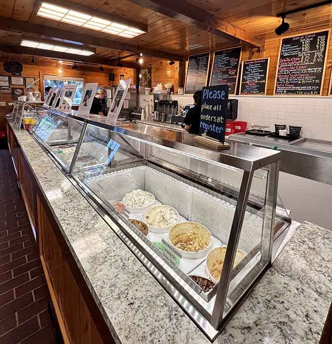 The ice cream counter stretches before you like a frozen frontier waiting to be explored and conquered.