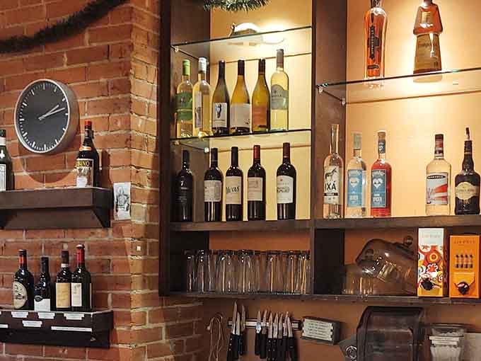 Wine bottles displayed like literary classics, because sometimes the best stories come from a well-chosen vintage.