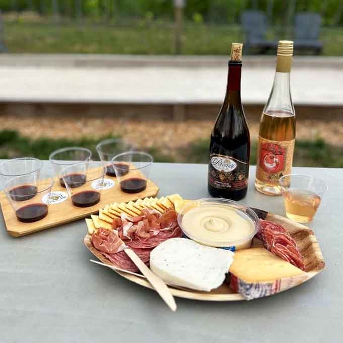 This charcuterie board situation proves that adult Lunchables are not only acceptable but absolutely encouraged when wine's involved.
