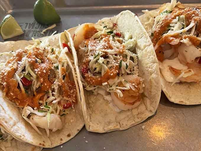 Shrimp tacos arrive dressed to impress, proving bowling alleys have seriously upped their culinary game lately.