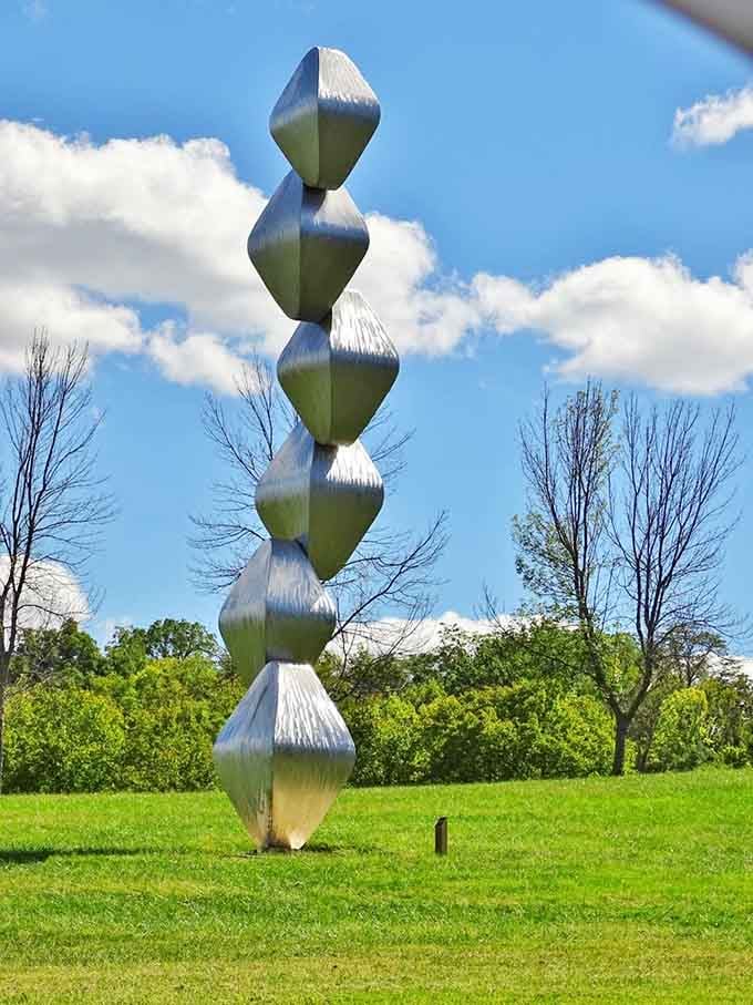 This gleaming tower reaches skyward like a metallic DNA strand that decided to show off a little.