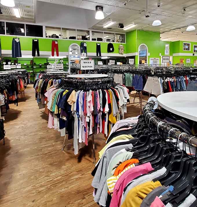 Bright green walls and circular racks create a shopping experience that's actually pleasant instead of overwhelming.