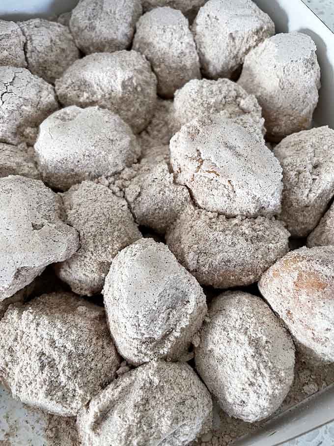 Cinnamon caramel donut holes that look like they've been dusted by angels with excellent taste in coatings.