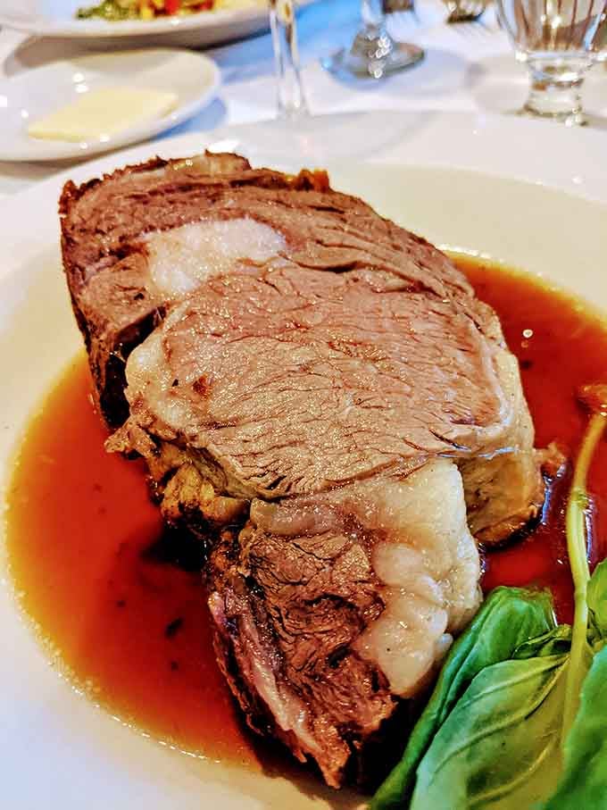 This prime rib could make a vegetarian reconsider their life choices, perfectly crusted and impossibly tender.