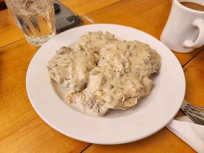Behold the star of the show, where fluffy biscuits meet creamy sausage gravy in perfect harmony.
