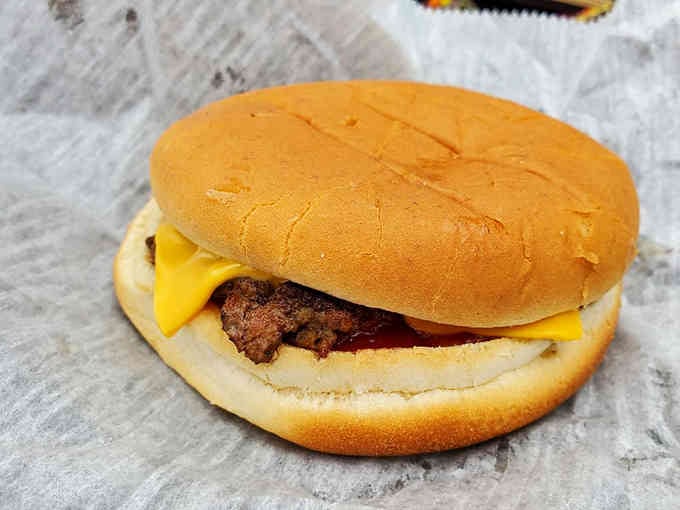 Simple perfection: melted cheese, juicy beef, soft bun. Sometimes the best things require no explanation whatsoever.