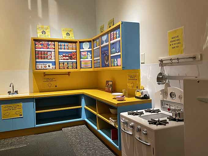 This vintage kitchen display captures the era when SPAM revolutionized American home cooking with shelf-stable convenience.