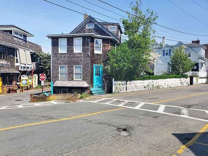Weathered shingles and a turquoise door prove that even the oldest buildings on Cape Cod know how to make a statement.