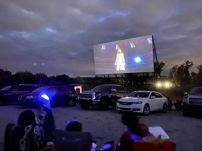 Families gather in the gravel lot, their vehicles transformed into personal theaters with the best seats in the house.