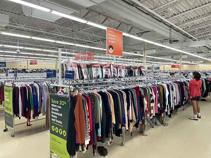Rows of clothing create a rainbow of possibilities, proving one person's closet purge is another's wardrobe jackpot.