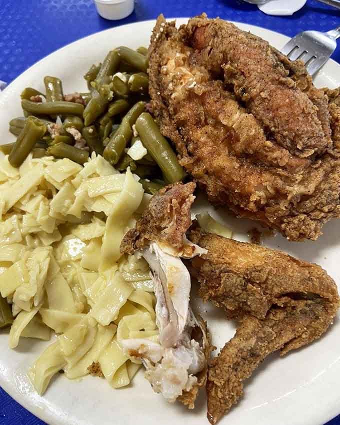 Golden, crispy fried chicken with tender cabbage and green beans proves simple done right beats fancy every time.