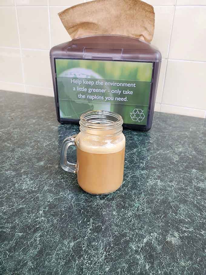 That mason jar mug holds liquid gold that'll make you rethink your entire morning routine immediately.