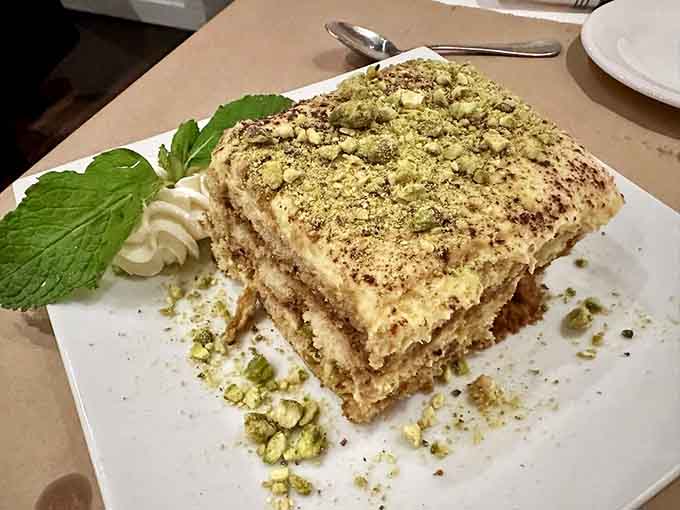 Pistachio tiramisu that looks like it belongs in a museum, but tastes even better than it photographs, which is saying something.