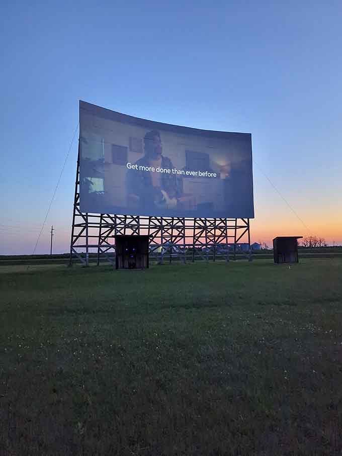 That towering screen against the sunset is your invitation to an evening of pure, uncomplicated joy.