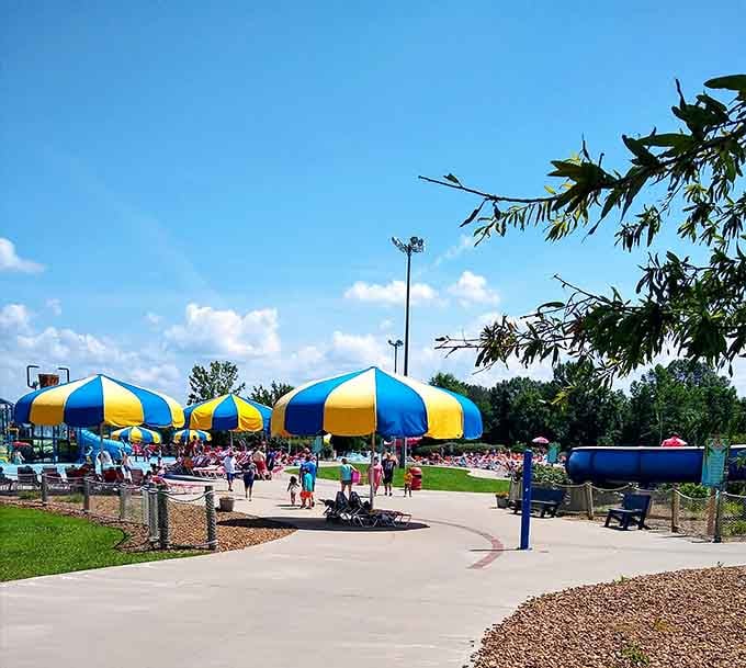 Classic striped umbrellas provide shade while you contemplate whether you're brave enough for another slide run.