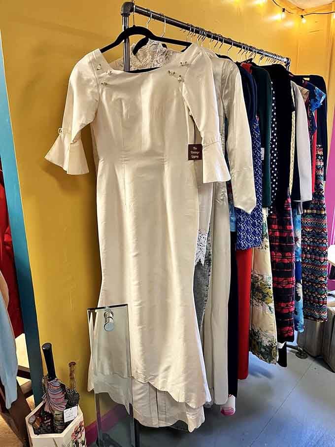 Elegant vintage dresses hang ready for their next chapter, proving quality fashion never goes out of style.
