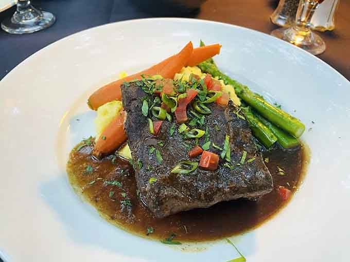 Braised short ribs so tender they practically surrender before your fork even arrives at the table.