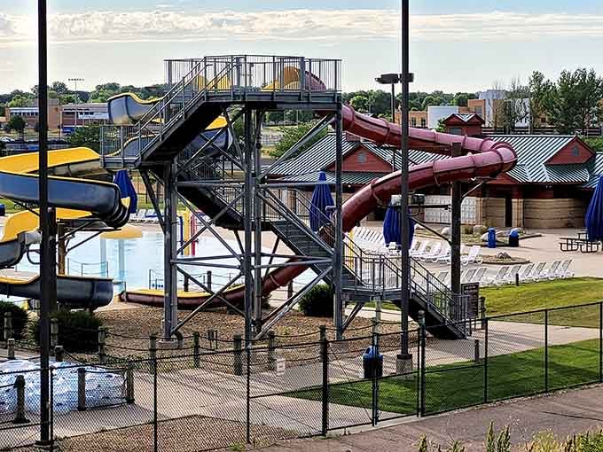 Multiple slides spiral down from towering heights, each one promising a different flavor of controlled terror and pure joy.