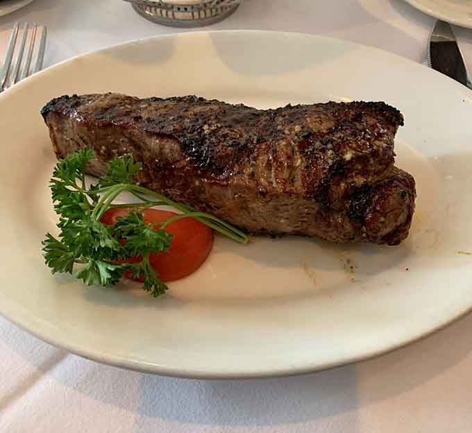 This perfectly charred strip steak with that gorgeous crust proves sometimes the simplest presentation is the most mouthwatering one available.