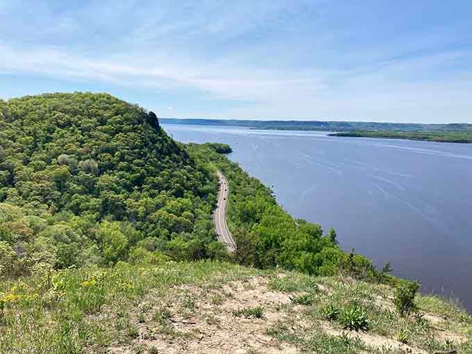 The Mississippi River valley stretches out below like nature's own masterpiece painting.