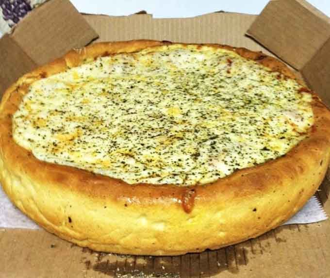 Behold the deep dish in all its golden-crusted, cheese-filled magnificence, ready to change your pizza standards forever.