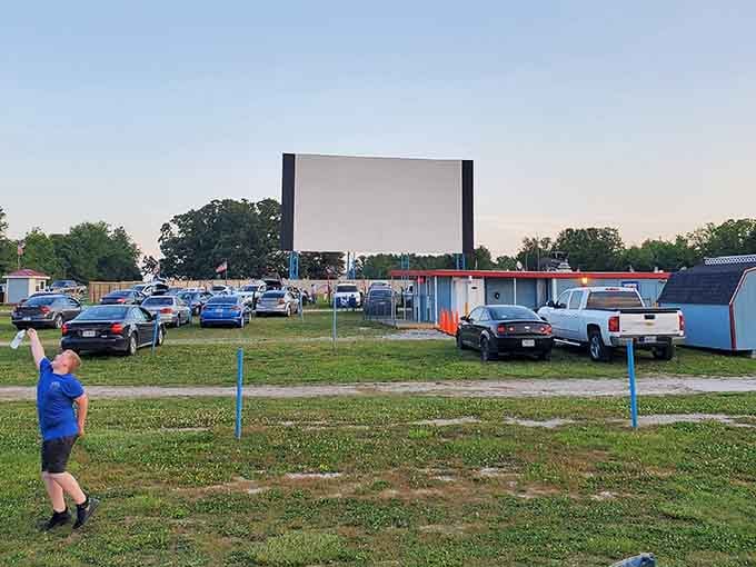 That massive screen against dramatic clouds is basically nature's own special effects department at work.