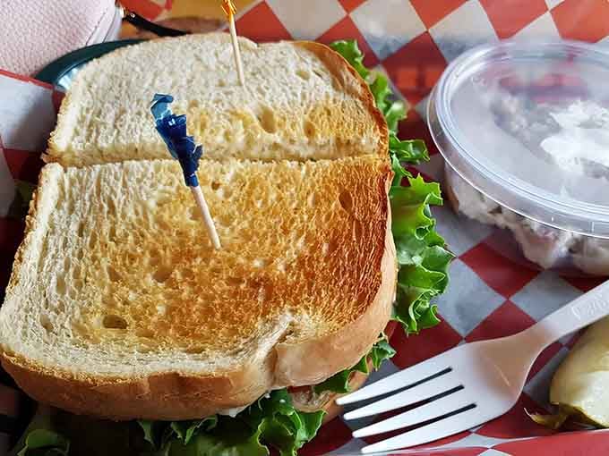 Golden toast cradling fresh ingredients, this is what sandwich dreams are made of, folks.