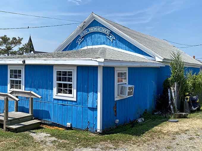 The cheerful blue building stands ready to serve seafood so fresh it practically requires an introduction before cooking.