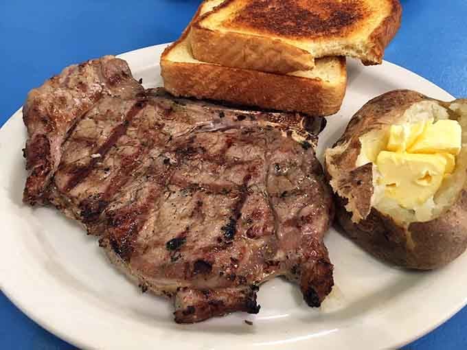 That T-bone with toast and baked potato looks like it could satisfy a lumberjack after a hard day's work.