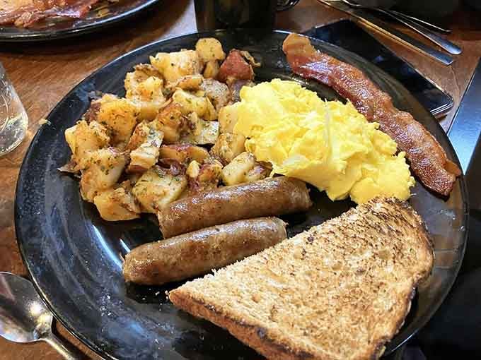 Golden scrambled eggs, crispy bacon, and perfectly seasoned potatoes prove simple done right beats fancy done wrong.