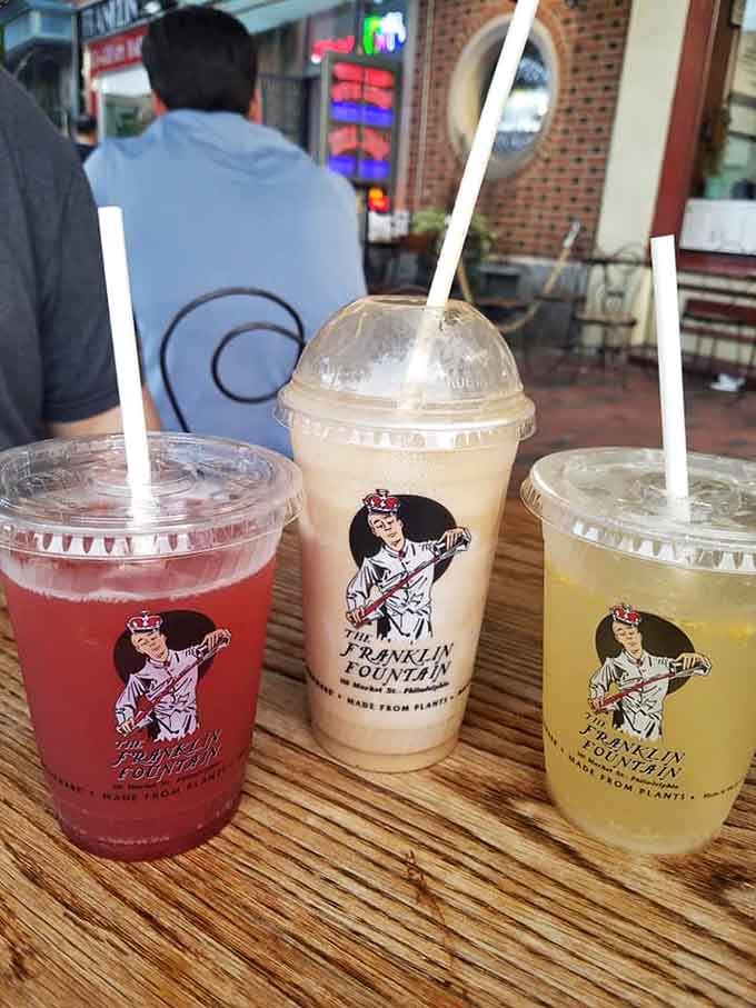 Three colorful sodas lined up like they're auditioning for a Norman Rockwell painting, and they all got the part.