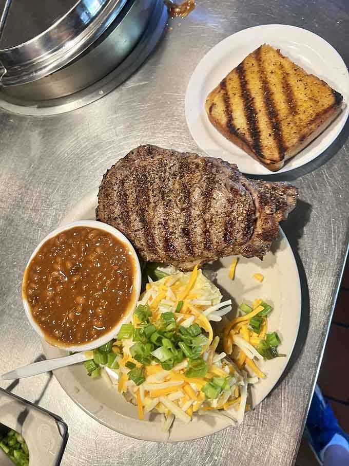 That perfectly seared ribeye with its beautiful grill marks is basically a love letter written in beef and fire.